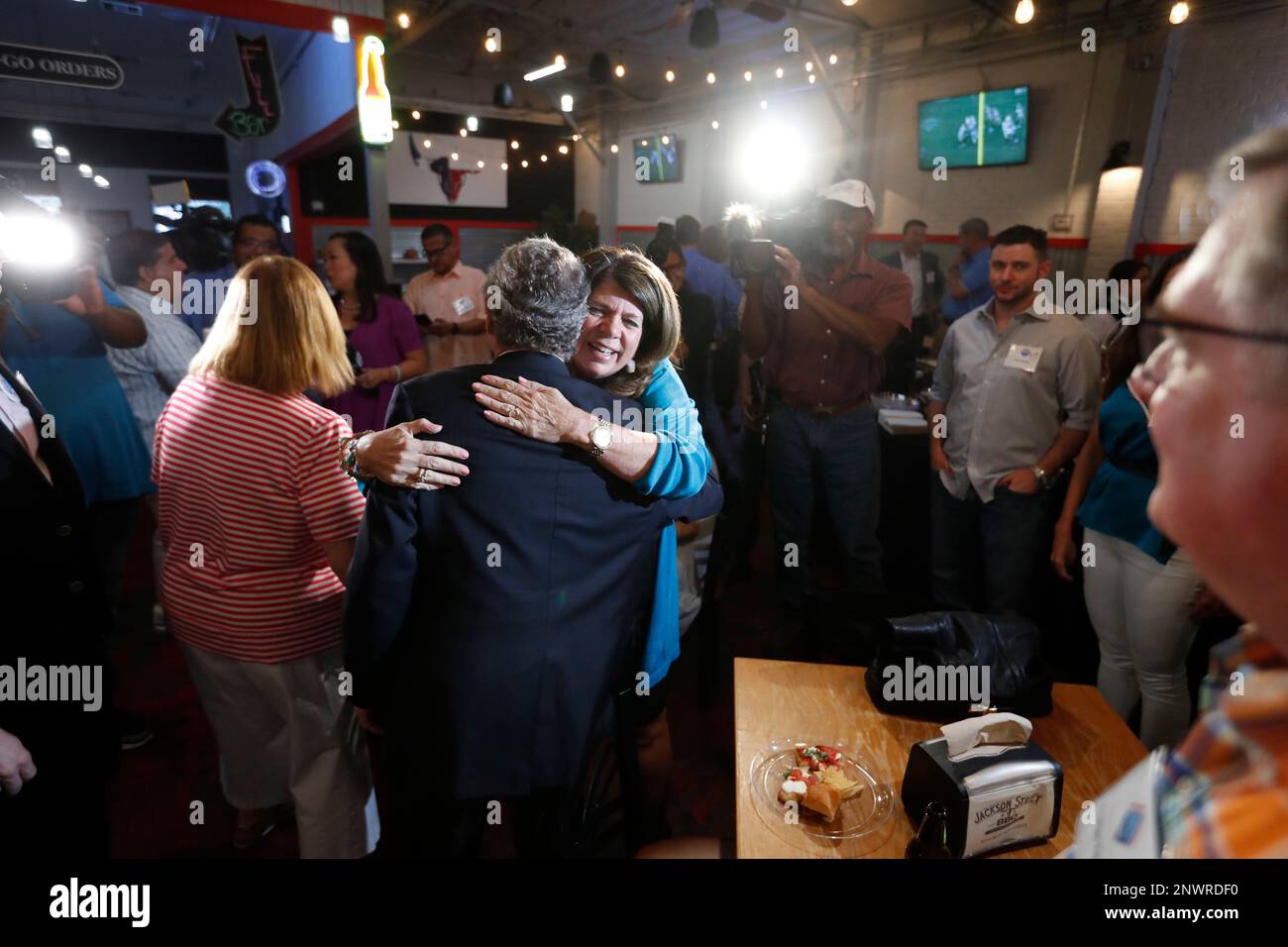 Harris County Judge Ed Emmett gets a hug from Kippy Caraway during the ...