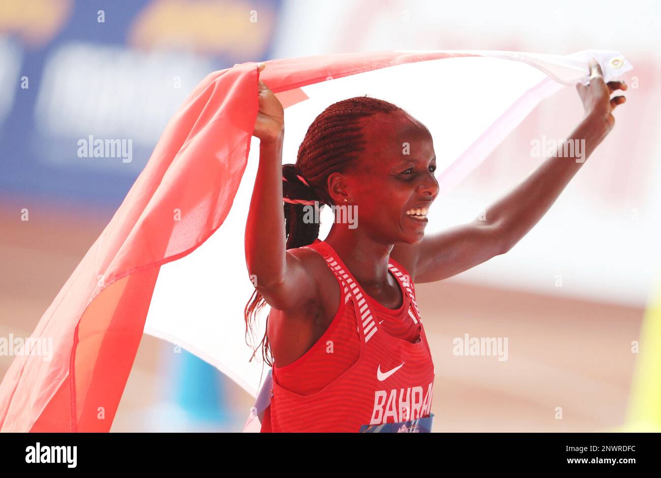 Bahrain's Rose Chelimo celebrates after crossing finish line during the ...