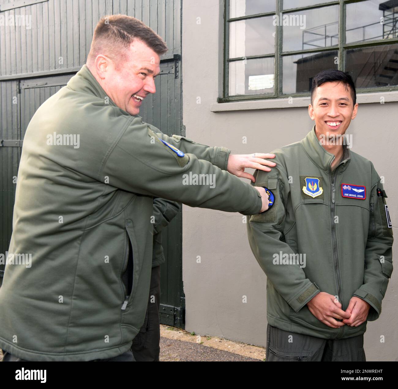 U.S. Air Force Lt. Col. Tyler Berge, left, 351st Air Refueling Squadron ...