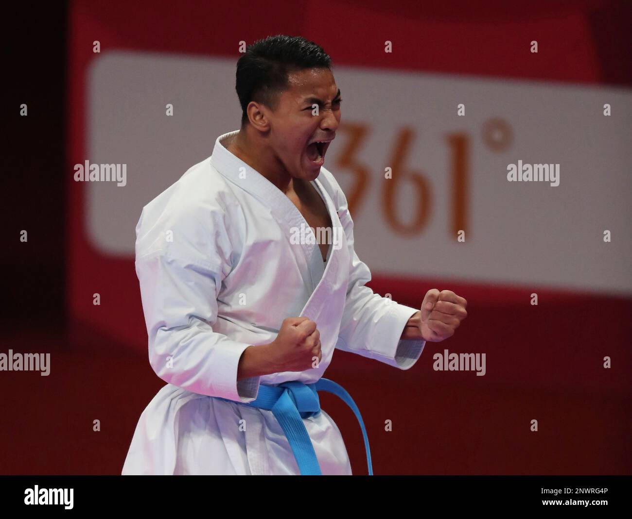 Indonesia's Ahmad Zigi ZARESTA YUDA reacts after performing the Karate ...