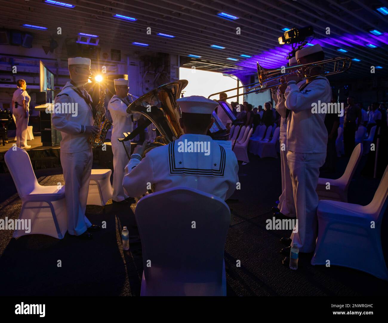 Sailors with the U.S. 7th Fleet Broadside Brass Band perform during a ...