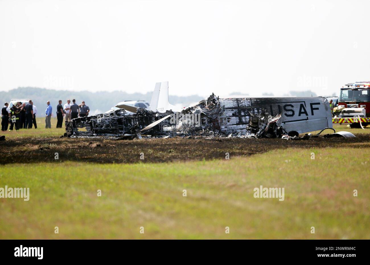 A vintage military airplane crashed and exploded Thursday, Aug. 23 ...