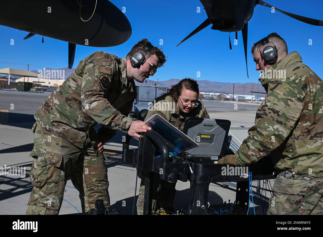 U.S. Air Force Staff Sgt. Daniel Rosser, left, Senior Airman Vanessa Torres, center, and Staff ...