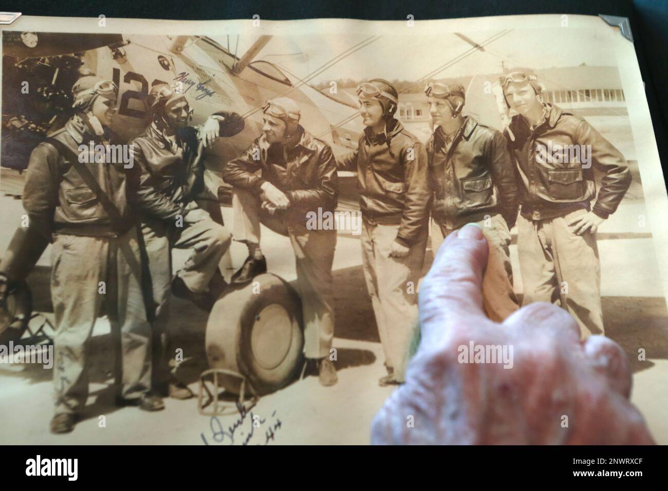 Susan Hall points to her father, James Lowe, Jr., in a photo with his ...