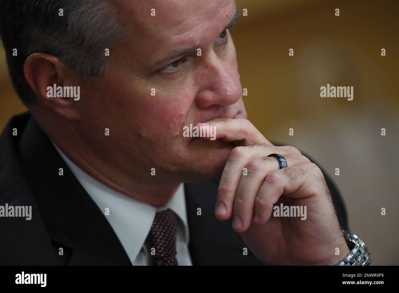 Michael J. Rourke, District Attorney for Weld County, listens to the ...