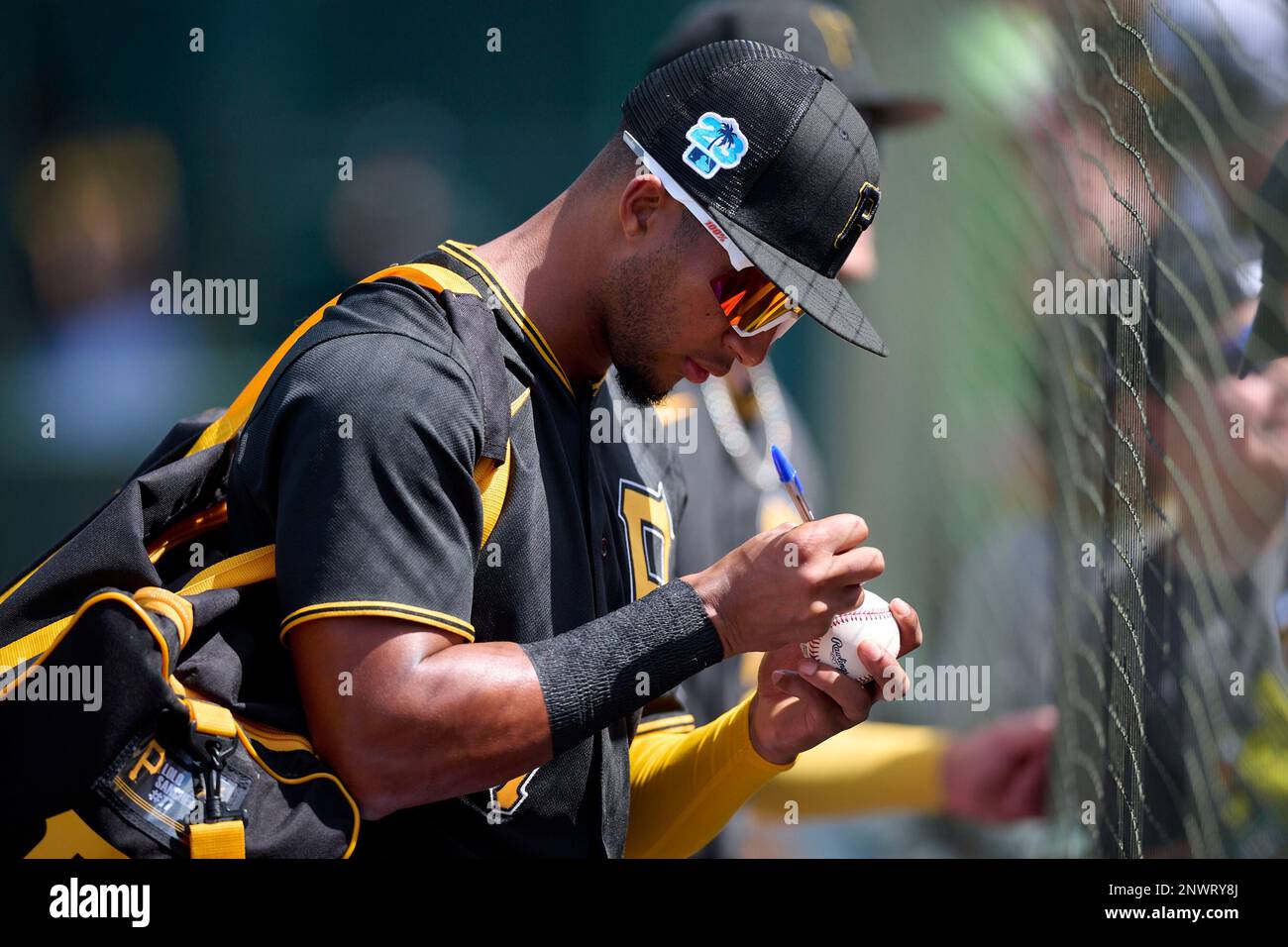 Pittsburgh Pirates Lolo Sanchez (77) signs autographs before a spring ...
