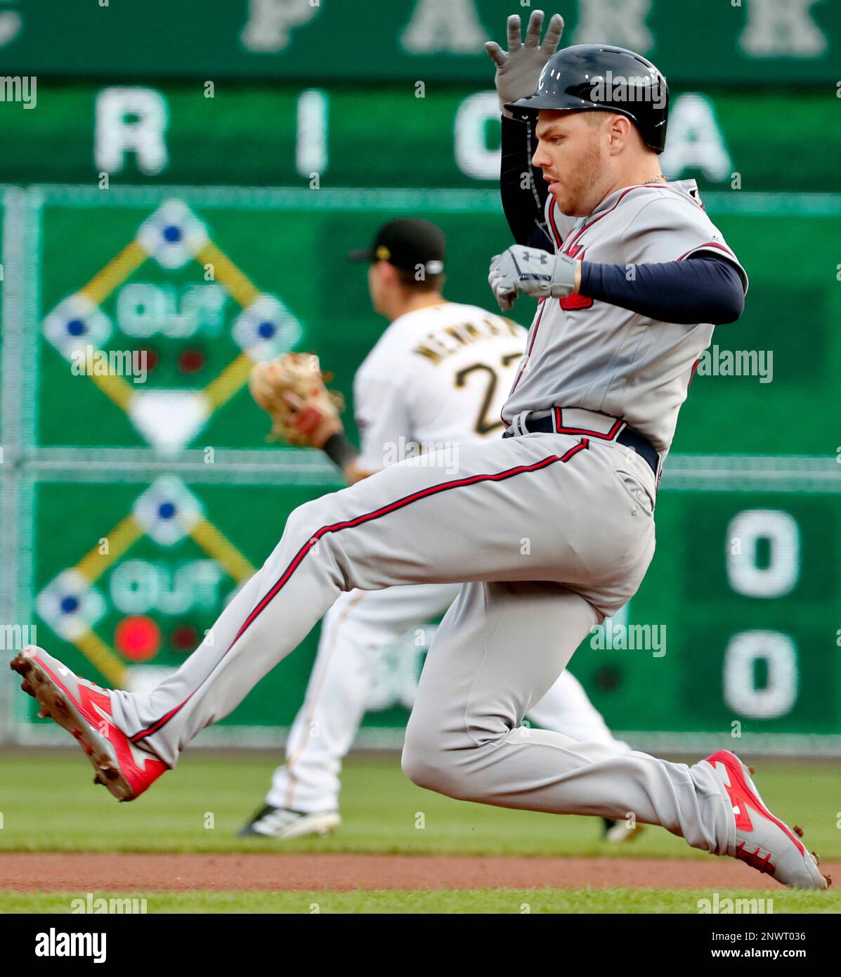 Atlanta Braves' Freddie Freeman, right, slides into second with a ...