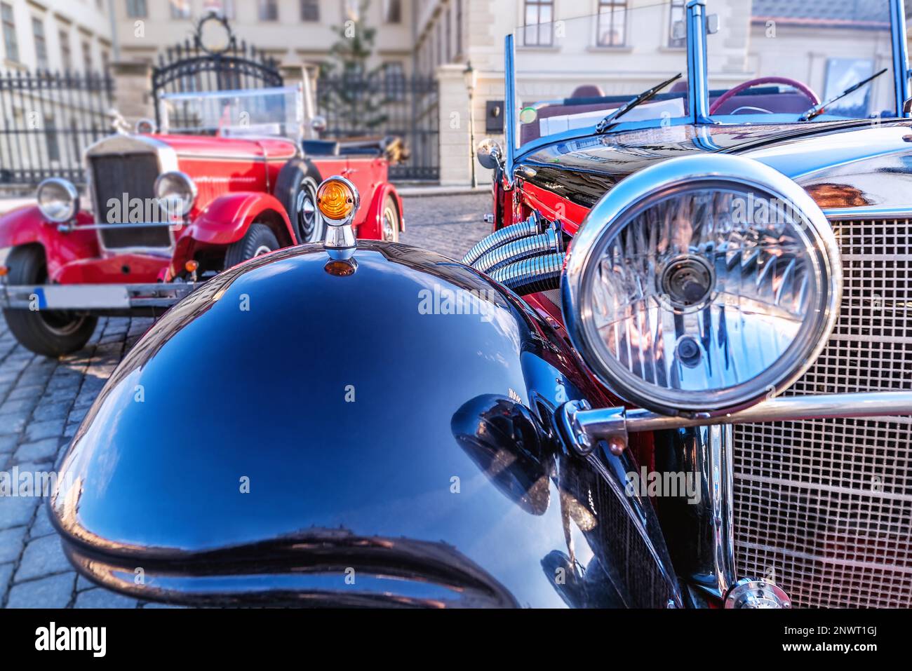 headlights of an red old timer Stock Photo - Alamy