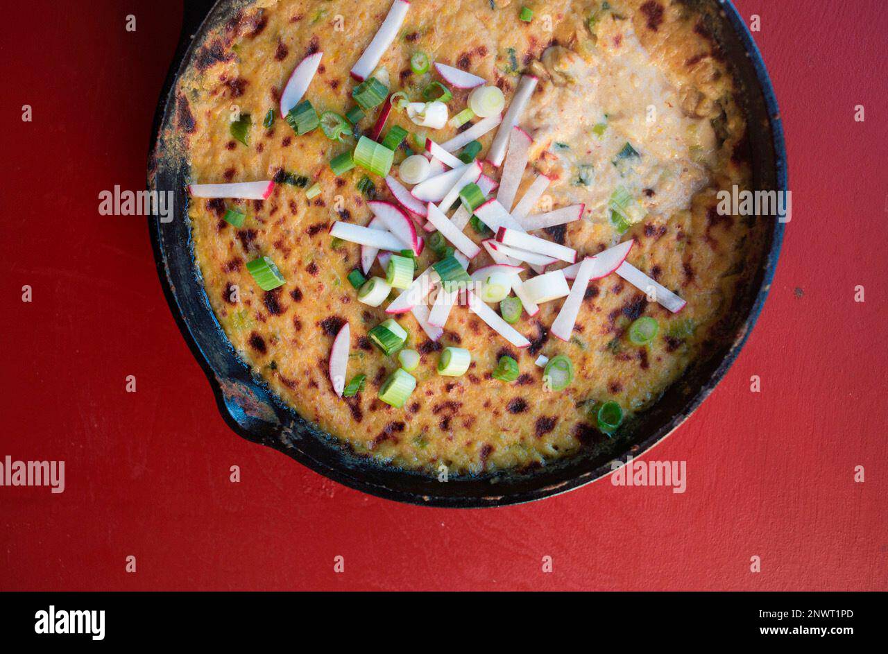 This November 2017 photo shows hot corn queso dip in New York. This ...