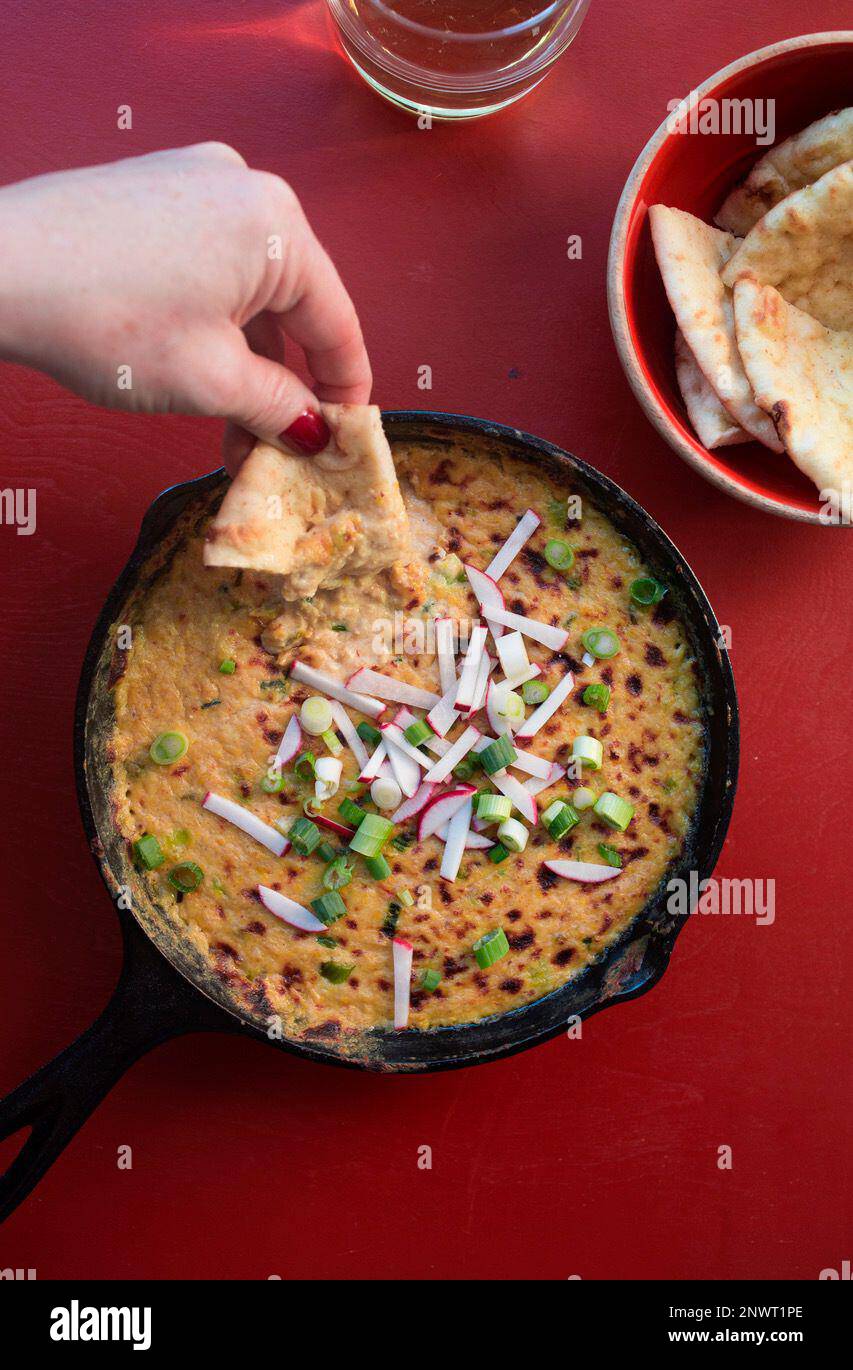 This November 2017 photo shows hot corn queso dip in New York. This ...