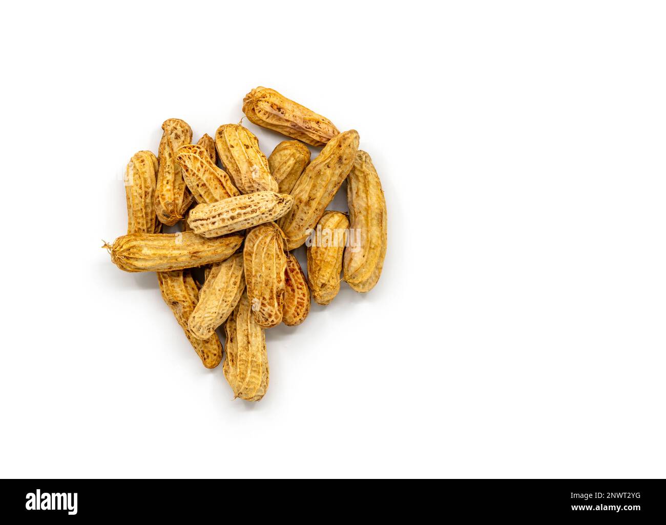 Top view a pile of stream peanuts, a small heap of peanuts with shells ...