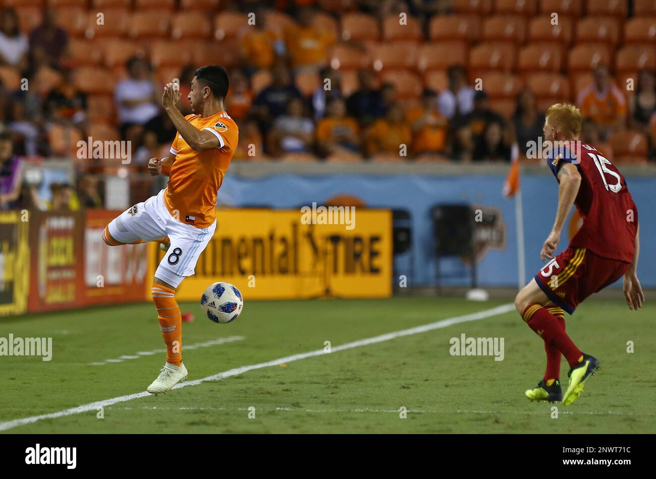 Houston Dynamo midfielder Memo Rodriguez (8) keeps the ball in play ...