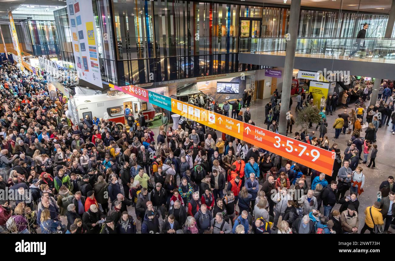Entrance to the travel trade fair with many visitors, according to the ...