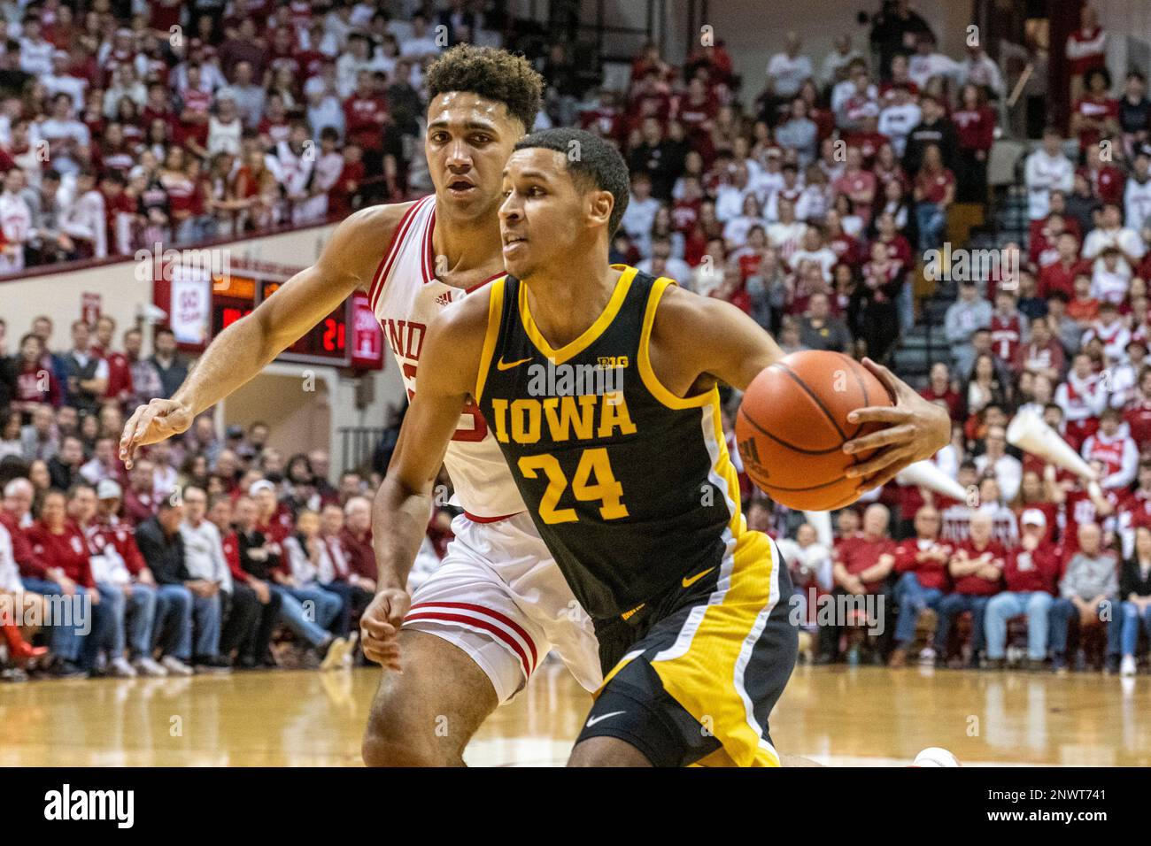 Iowa forward Kris Murray (24) drives past Indiana forward Trayce ...