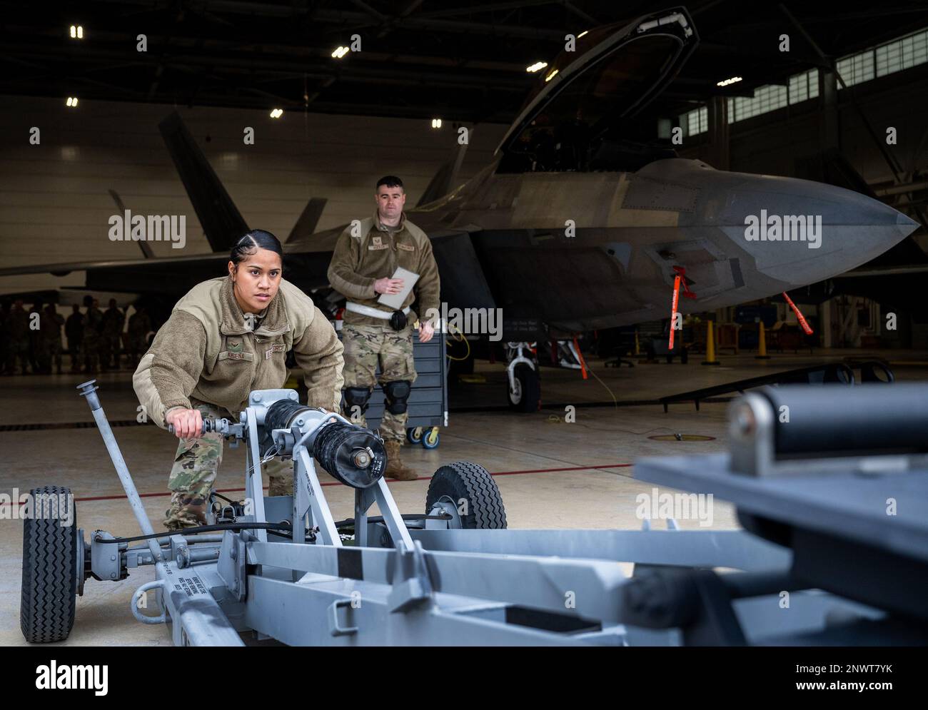 Airman 1st Class Leata Kisena, 43rd Fighter Generation Squadron, raises ...