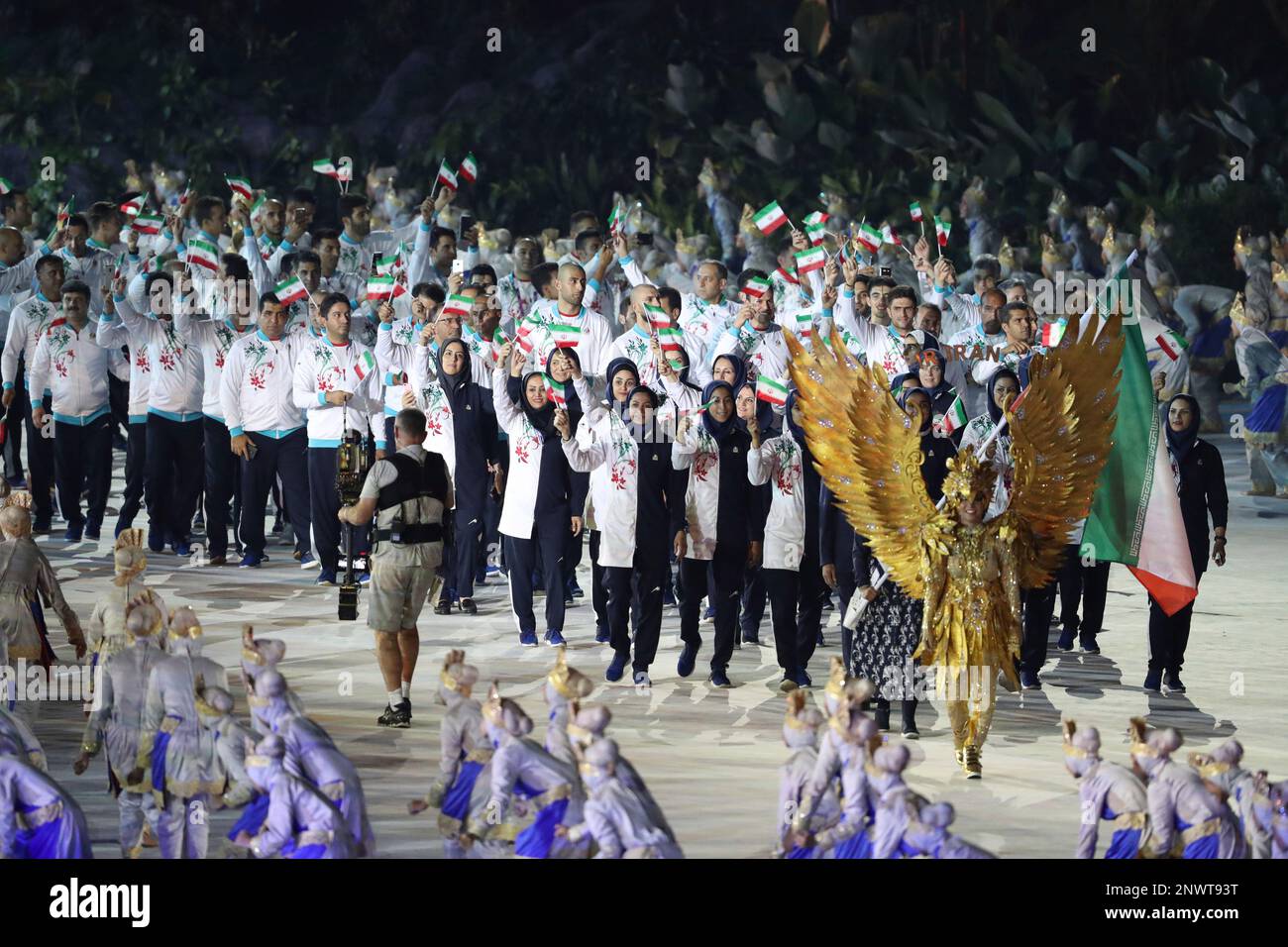 Iran's athletes and members march during an opening ceremony of the ...