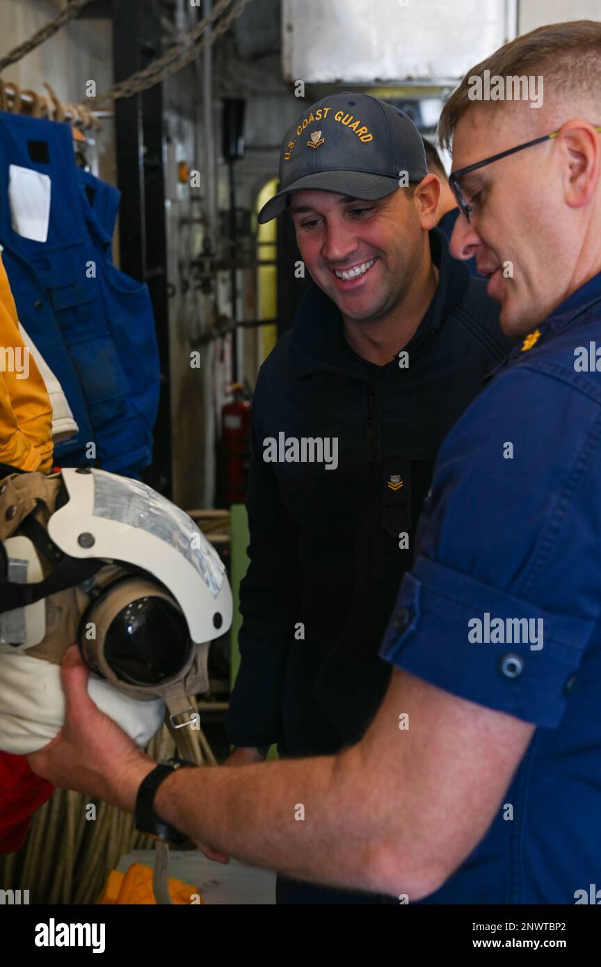 U.S. Coast Guard Lt. Cmdr. Michael Gereau, right, an Aviation Training ...