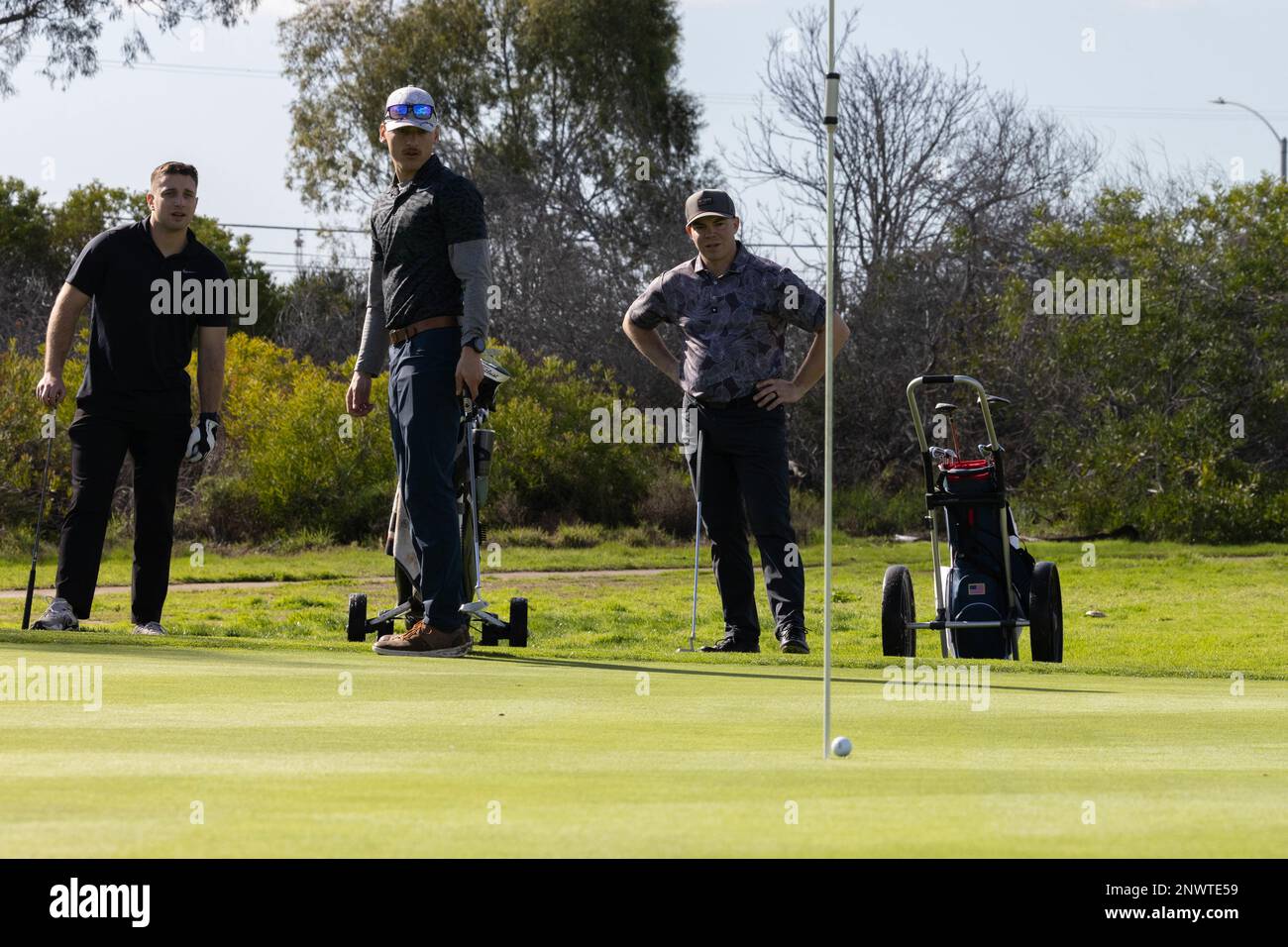 U.S. Marine Corps 2nd Lt. Grant Robbins (left), an intelligence officer ...