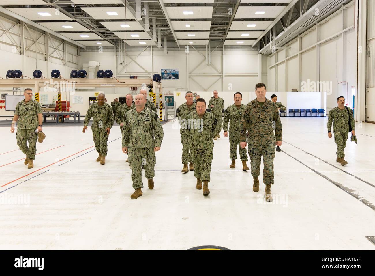 Chief of Naval Personnel Vice Adm. Rick Cheeseman, center, is given a ...