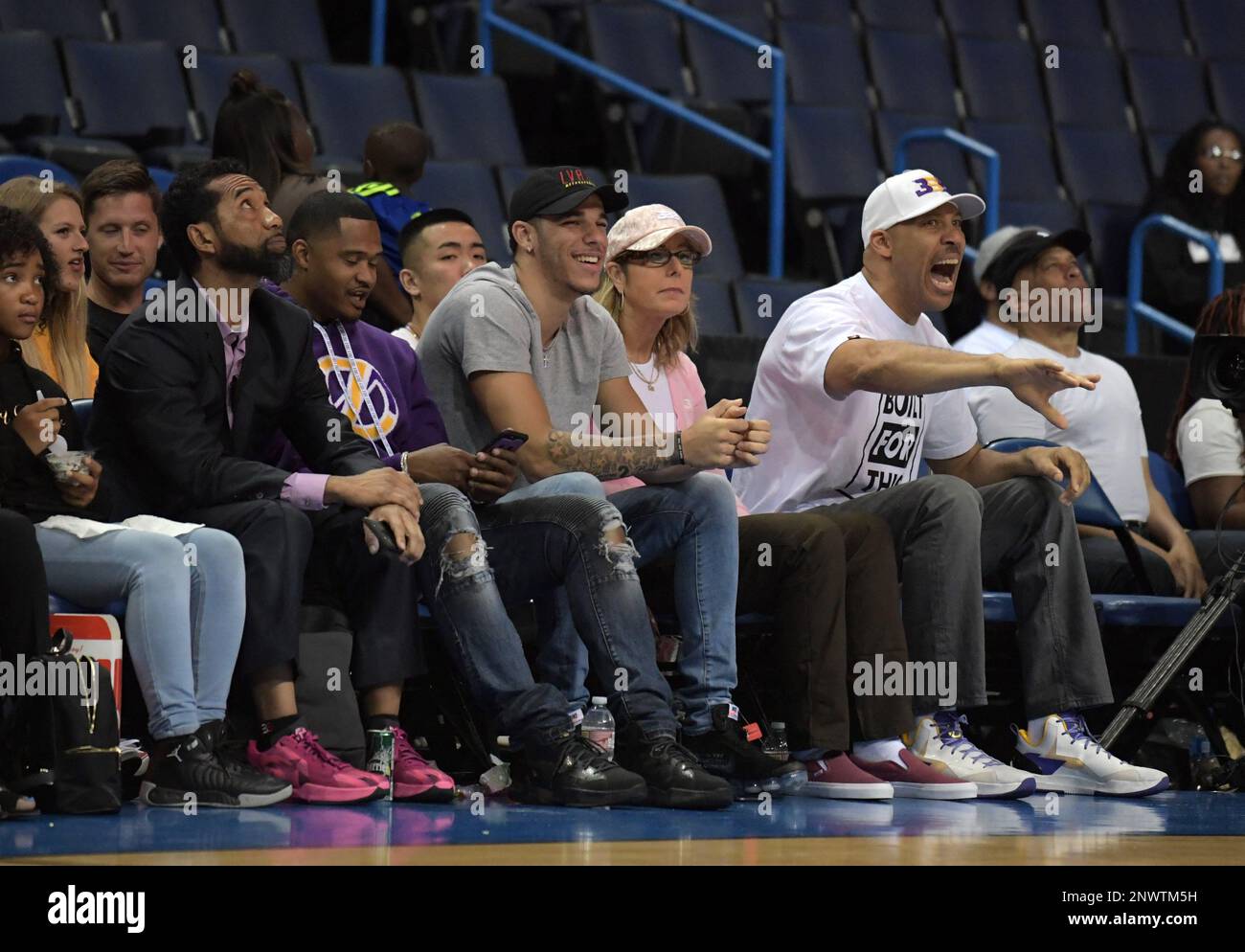 Alan Foster, Darren Moore, Lonzo Ball, Tina Ball and LaVar Ball watch ...
