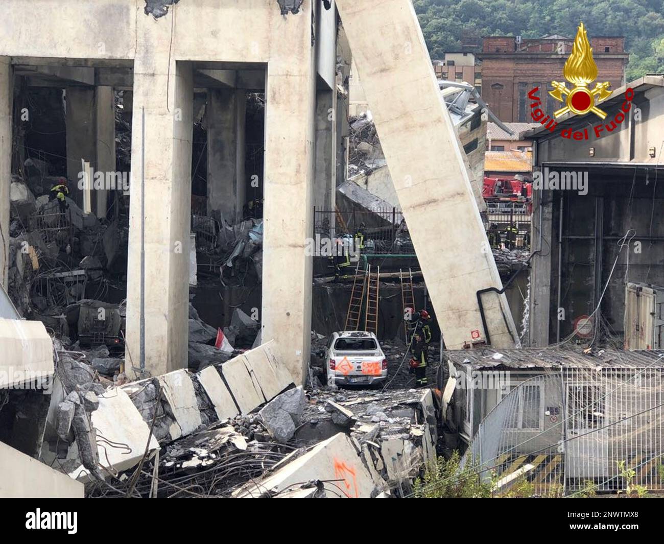 In this photo released by the Italian firefighters, rescue teams work ...