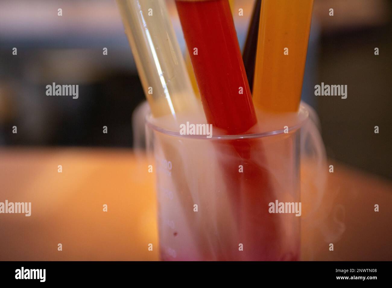 Science experiment with fire on dry ice Stock Photo - Alamy