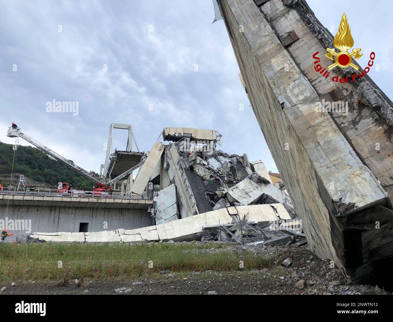 In this photo released by the Italian firefighters, rescue teams work ...