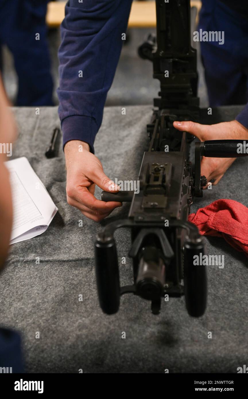 U.S. Coast Guard Petty Officer 2nd Class Jeremiah Johnson, a gunner’s ...