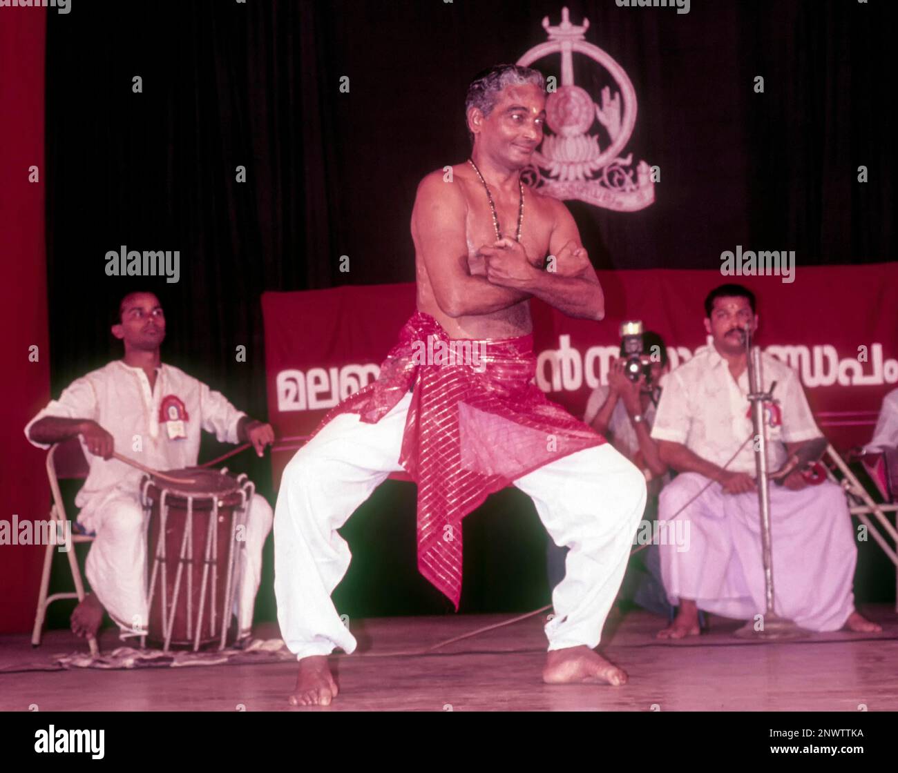 Kalamandalam Gopi demonstrating kathakali exercise in Kerala ...