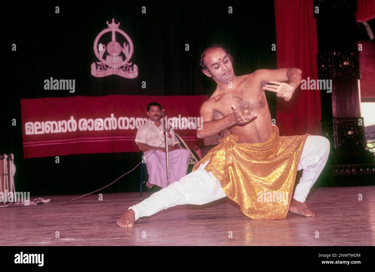 Kalamandalam Balasubramanian demonstrating kathakali exercise in Kerala ...