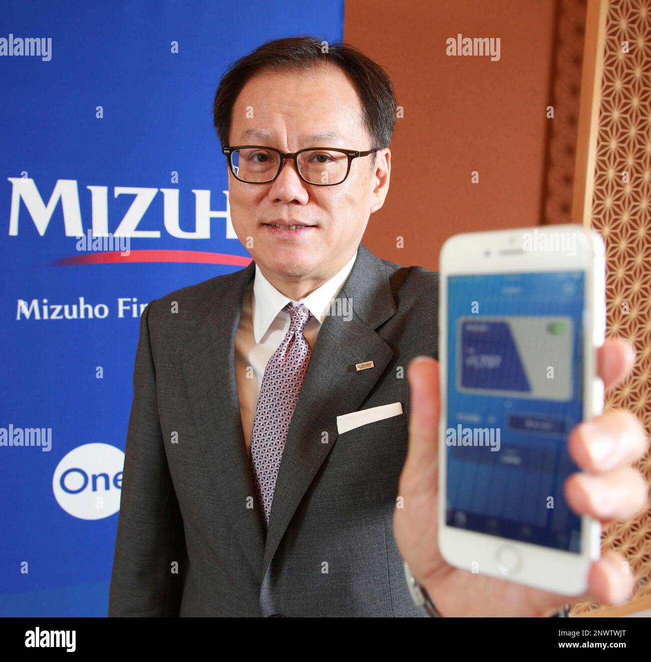 Tatsufumi Sakai, President & Group CEO of Mizuho Financial Group, pose ...
