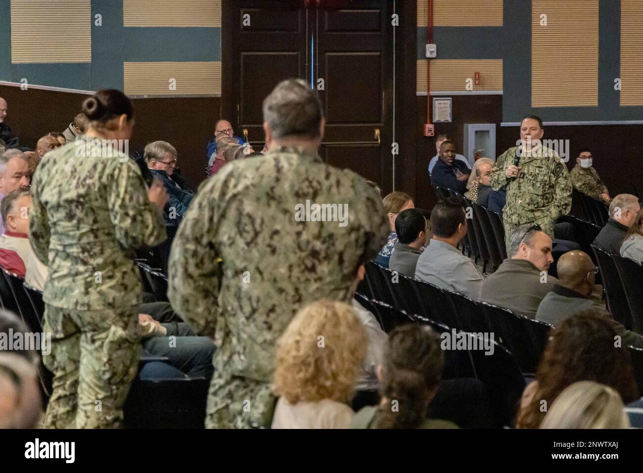 Chief of Naval Personnel Vice Adm. Rick Cheeseman, right, answers a Sailor’s question at an all ...