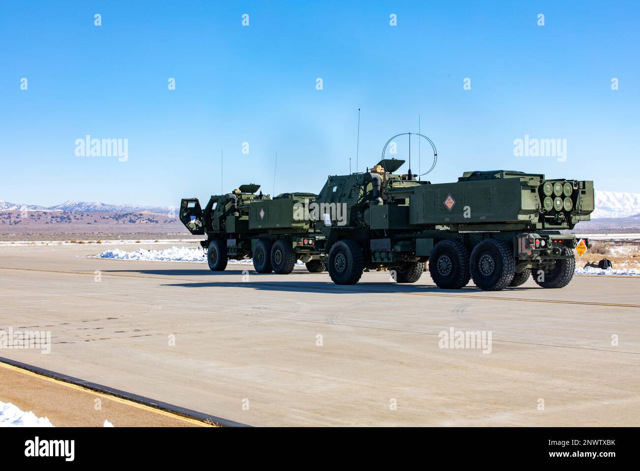 Two HIMARS set up on a runway in Utah as part of exercise Scarlet ...