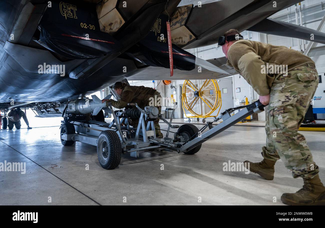 A 43rd Fighter Generation Squadron weapons load crew moves a GBU-32 ...