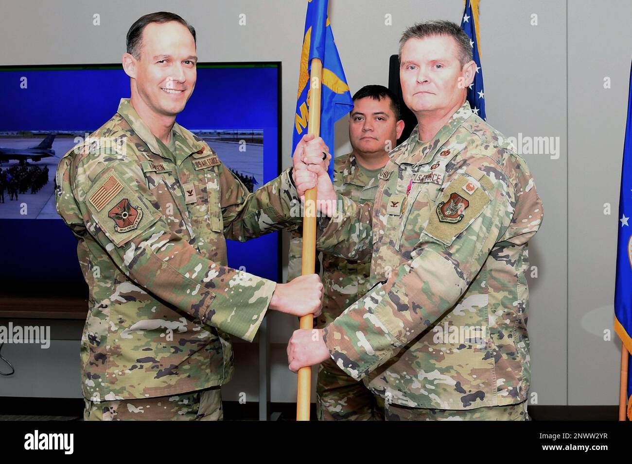 (left) Col. Benjamin Harrison, 301st Fighter Wing commander, receives ...