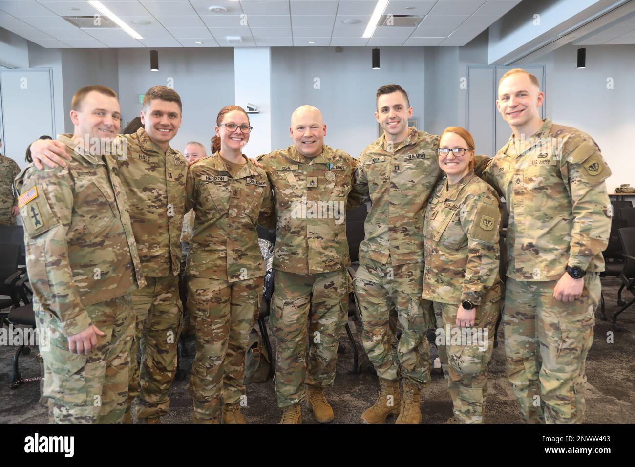 Staff Sgt. Matthew Joski (center) of the 1157th Transportation Company ...