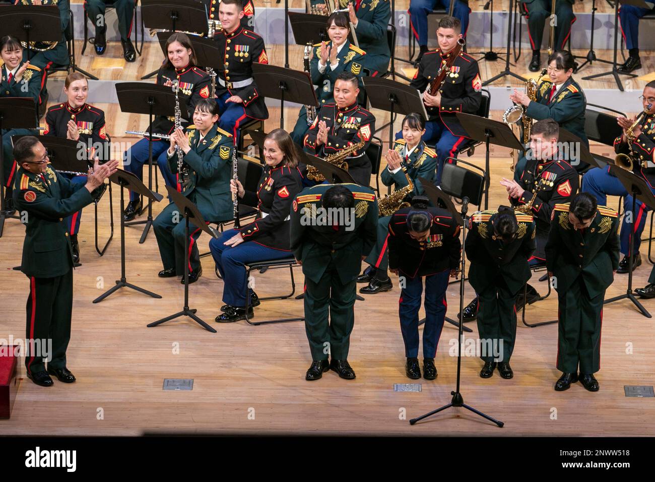 U.S. Marines with the III Marine Expeditionary Force Band and members ...