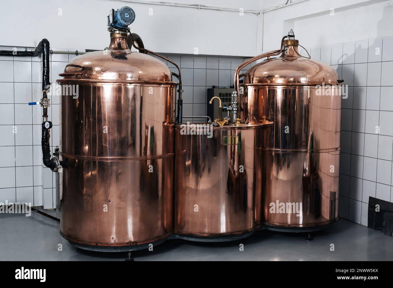interior of a modern brewery with copper tanks for beer production ...