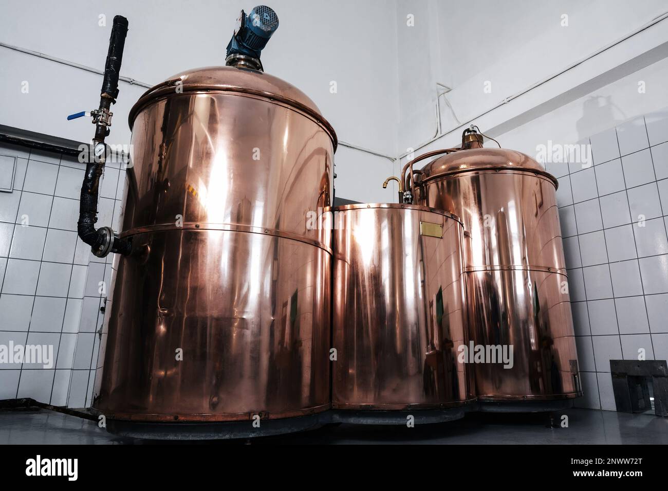 interior of a modern brewery with copper tanks for beer production ...