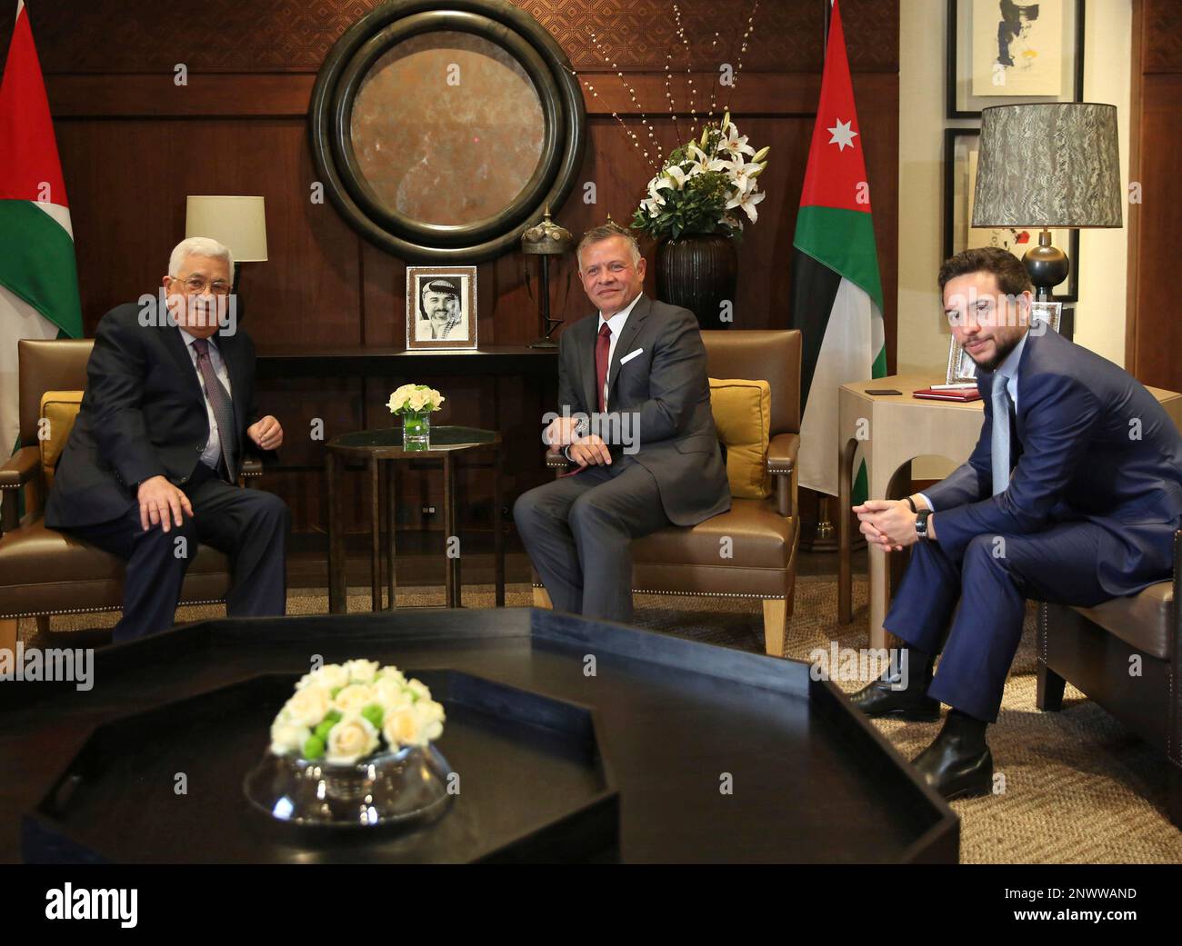 King Abdullah II of Jordan, center, and his son, Crown Prince Hussein ...