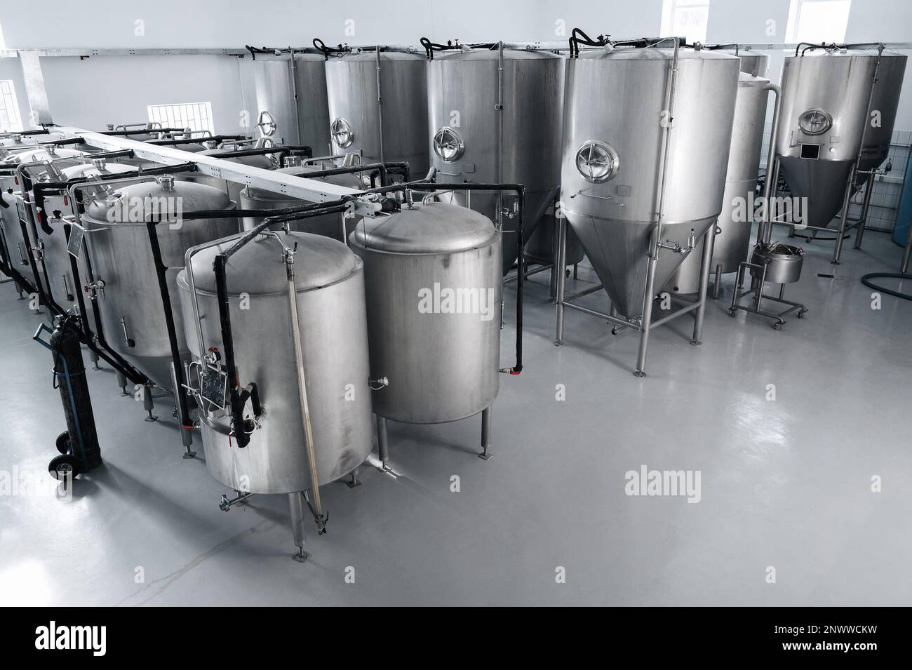beer production plant. interior of a modern technological brewery Stock ...