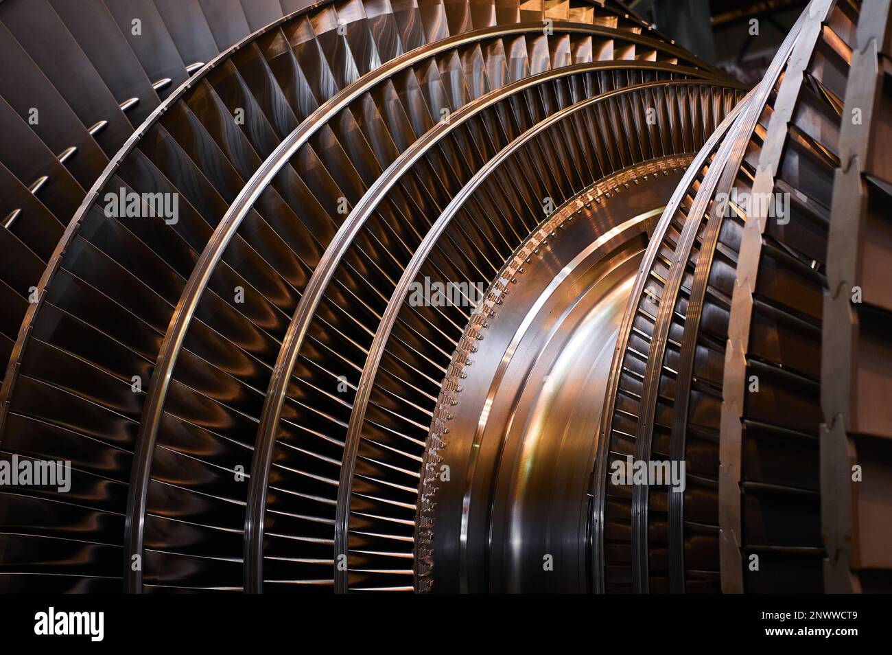 Golden rotor with blade rings of steam turbine in workshop Stock Photo ...