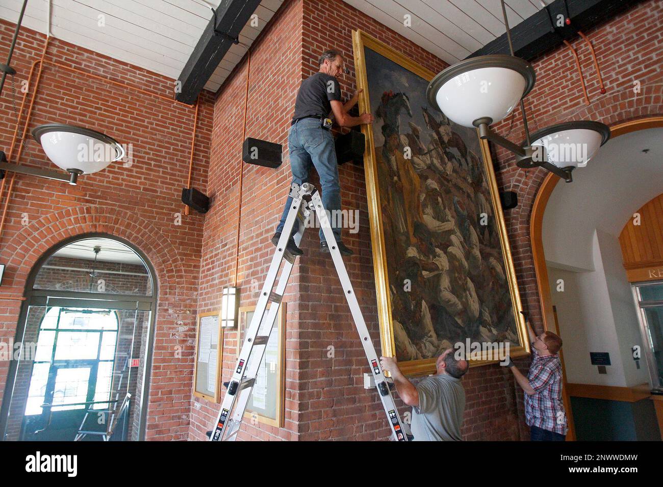 In this July 31, 2018 photo, Providence Picture Frame lead installer ...