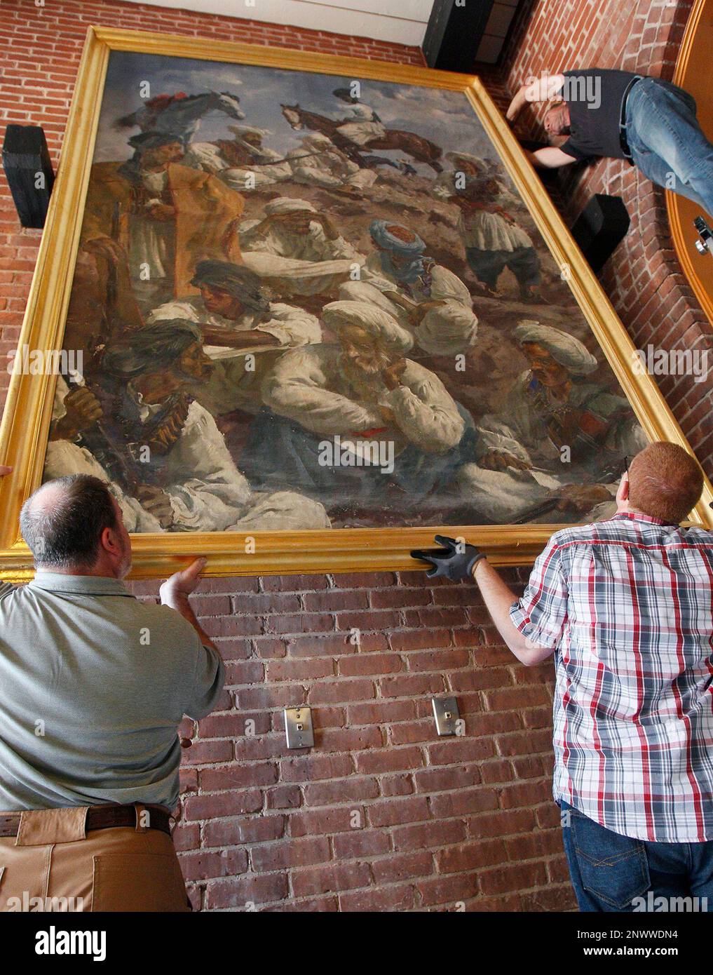 In this July 31, 2018 photo, Providence Picture Frame owner Geoff Gaunt ...
