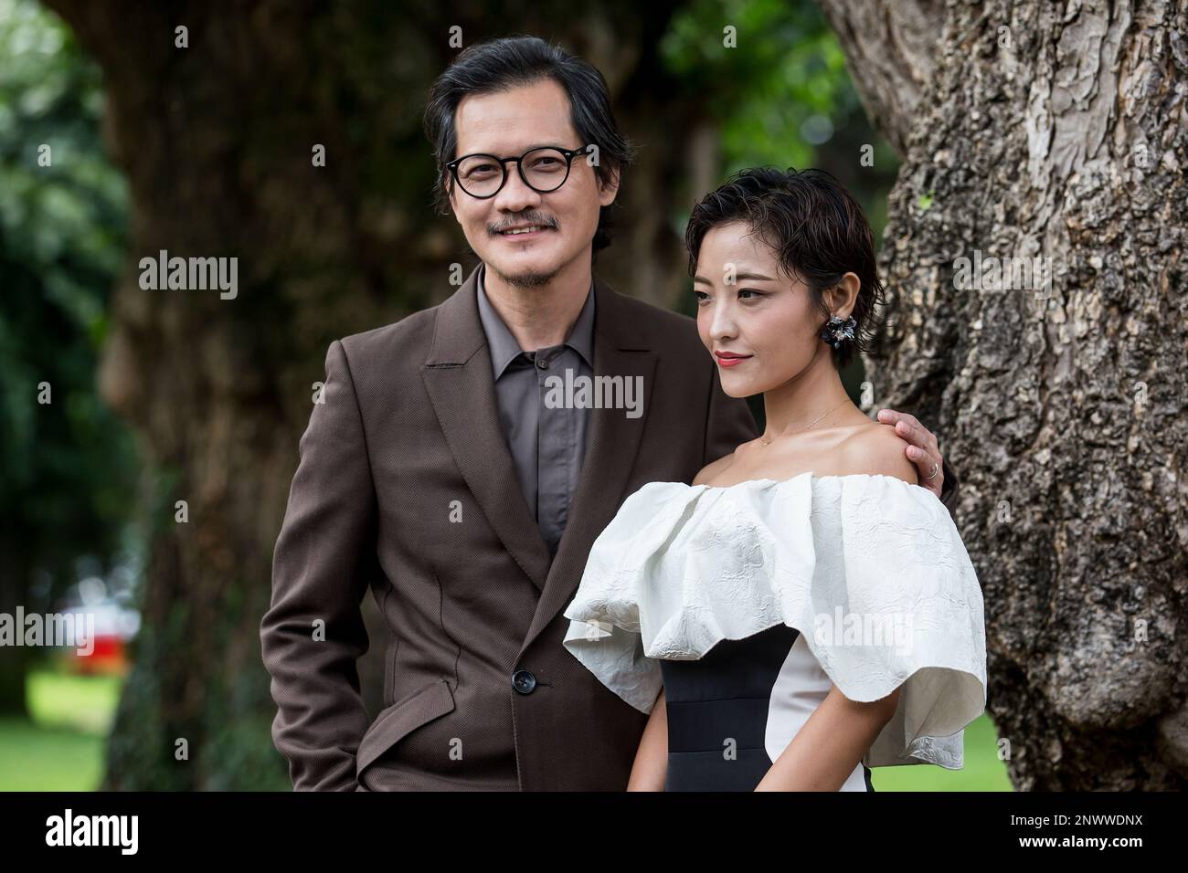 Singaporean actor Peter Yu and Chinese actress Luna Kwok, from left, pose during a photocall for ...