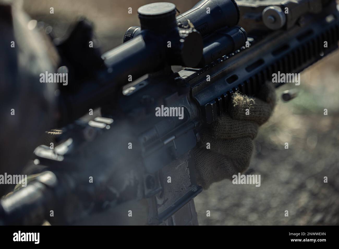 A U.S. Marine Corps rifleman with 3d Battalion, 4th Marines, fires an ...