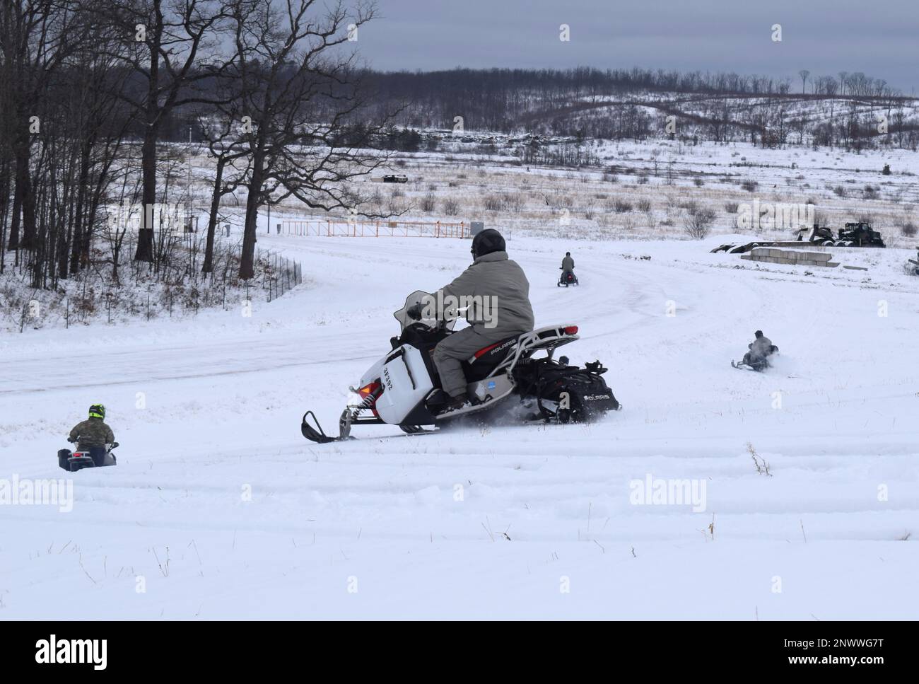 Members of the Michigan National Guard transit Grayling Aerial Gunnery ...