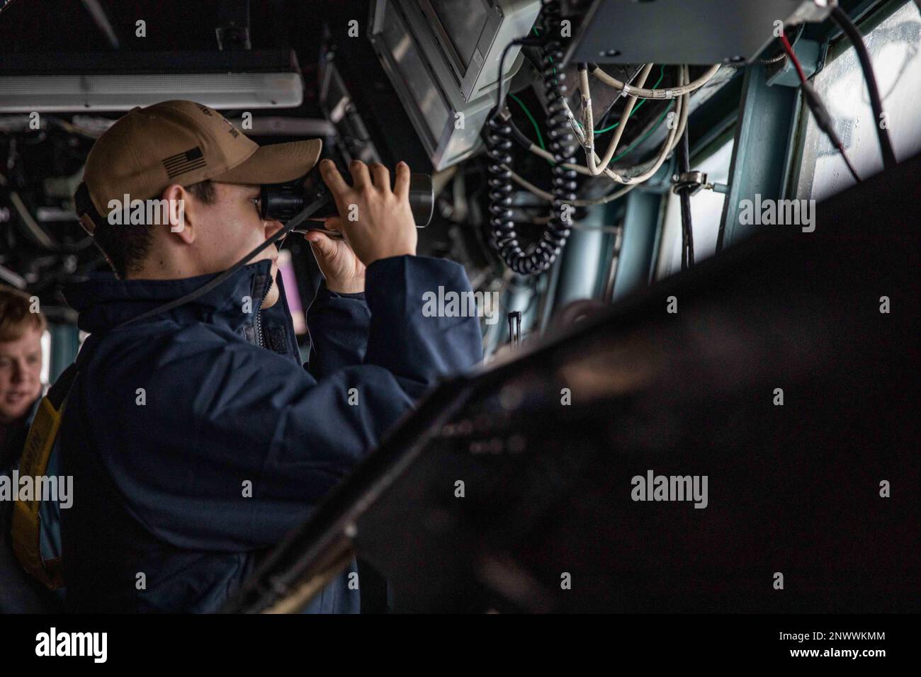 DANISH STRAITS (Jan. 7, 2023) Ensign Corey Shideler looks through ...
