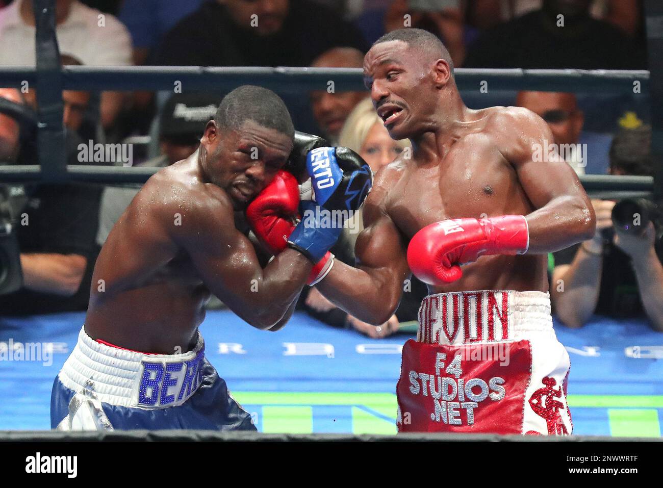 Devon Alexander lands an uppercut to the face of Andre Berto during a ...