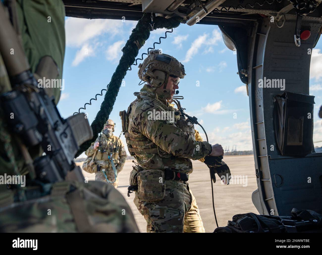 304th Rescue Squadron pararescuemen prepare to take off in an HH-60G ...